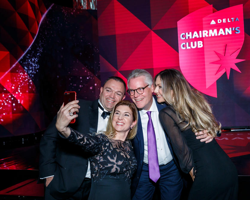 Ed Bastian selfie with employees at Chairmans Club Gala | Delta News Hub